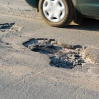 What You Need To Know About Potholes And Car Accidents
